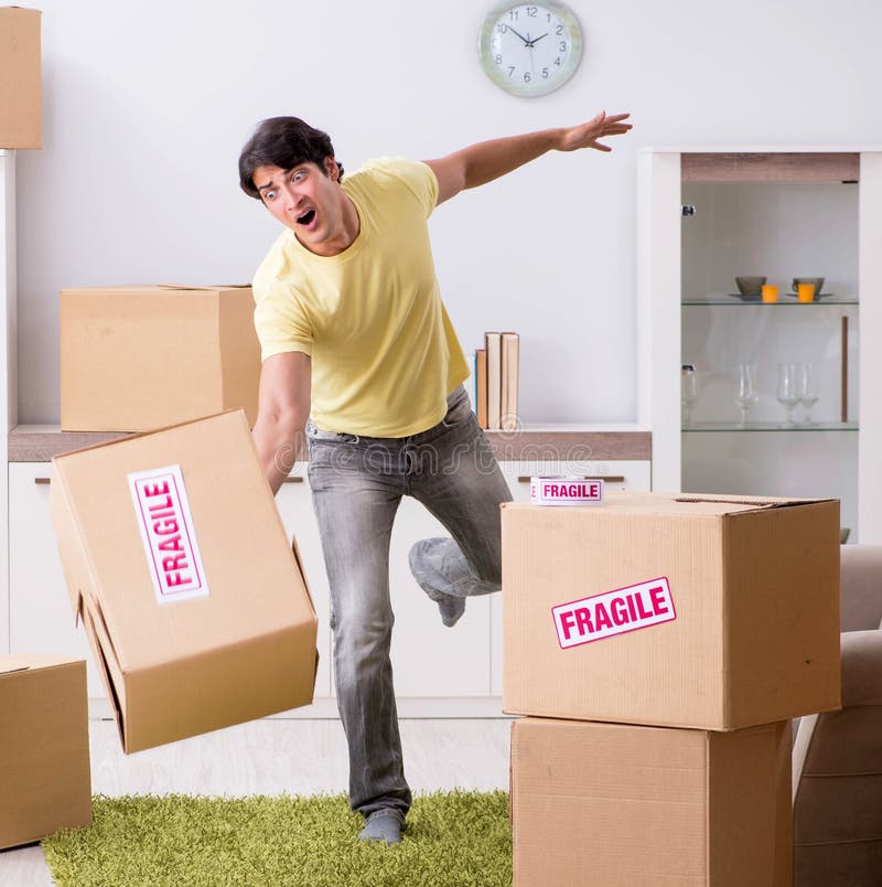 Man Moving House and Relocating with Fragile Items Stock Image - Image ...