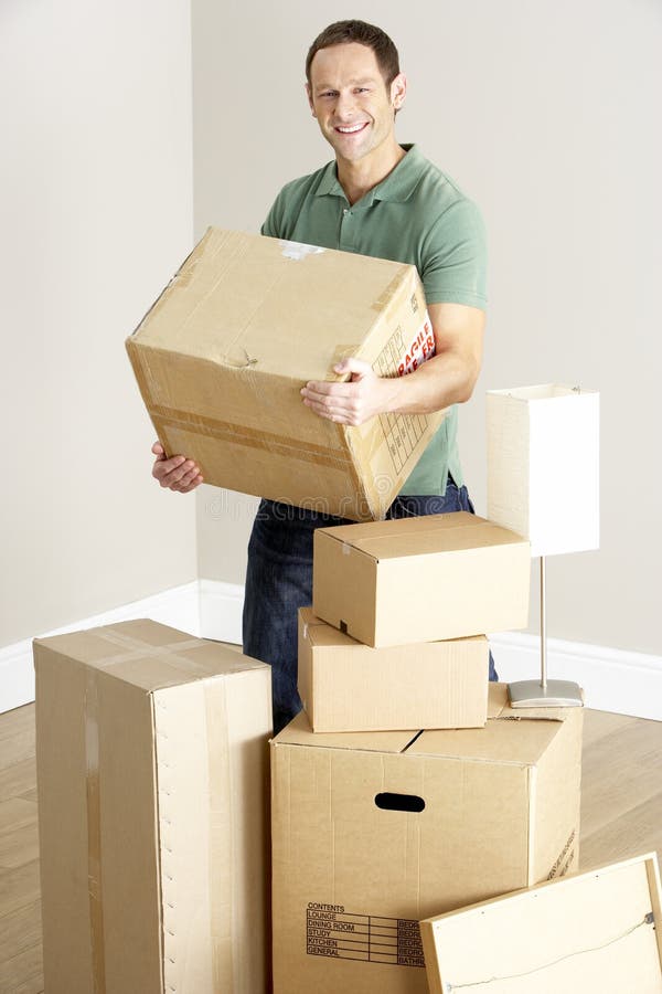 Man Moving into New Home stock image. Image of moving - 10003087