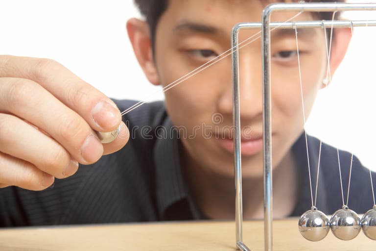 Man moving Newton balls stock photo. Image of metal, male - 20728062