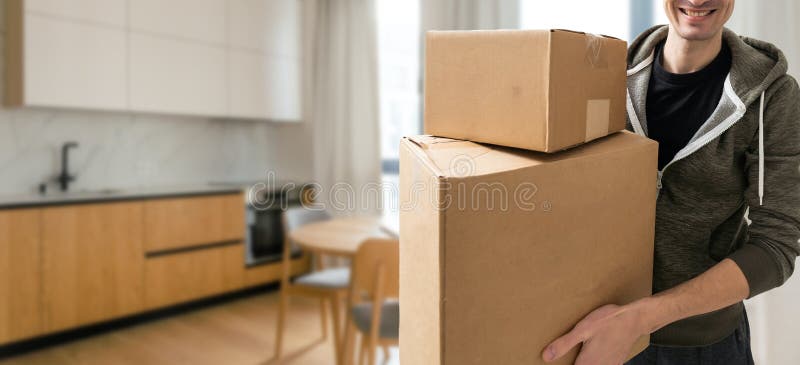 Man Moving To a New Home with Box Stock Photo - Image of holding ...