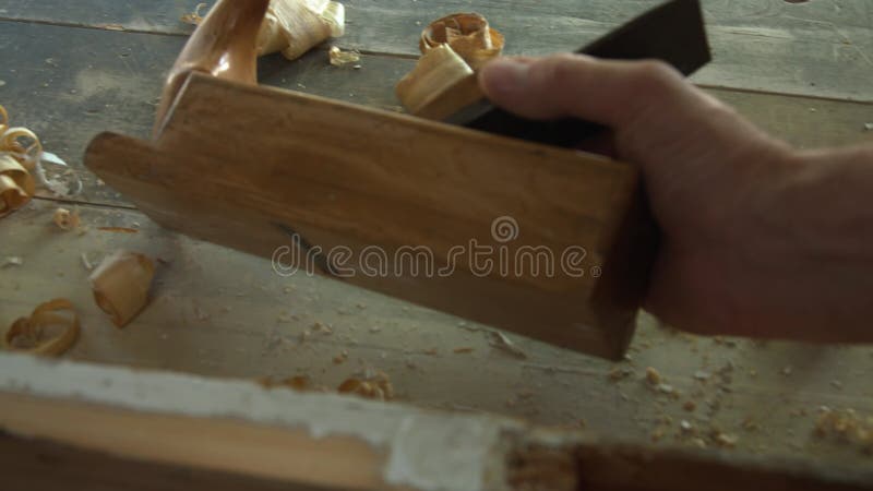 Man Moving a Woodworking Tool - Soviet Wooden Planer on a Table with ...