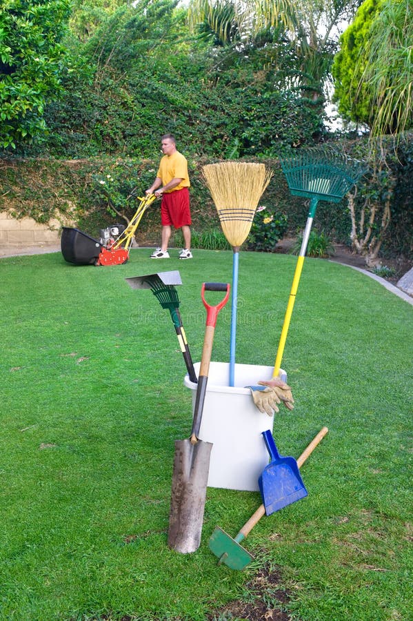 Man mowing lawn stock image. Image of service, selective - 14221295