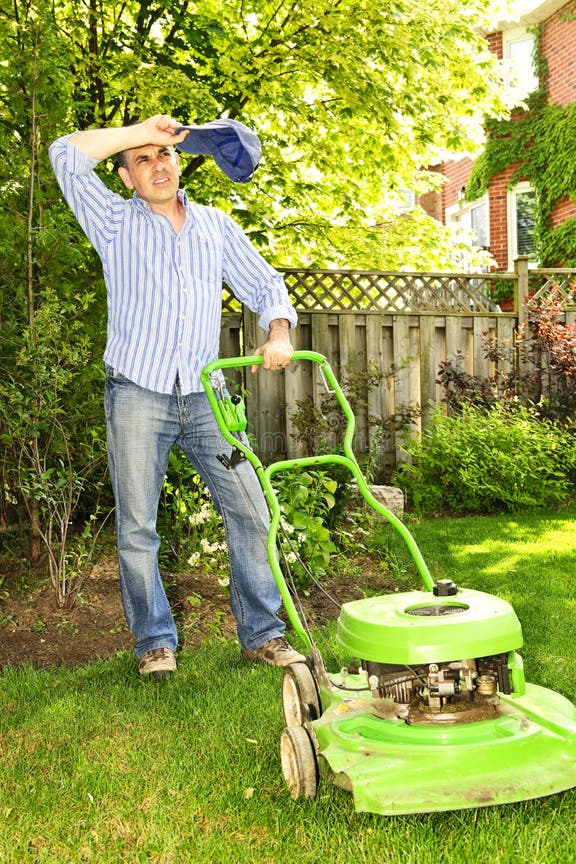 Man mowing lawn stock image. Image of forehead, cutting - 14999239