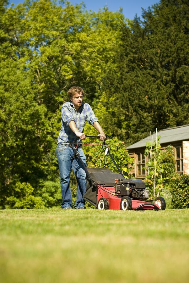 Man mowing lawn stock photo. Image of portrait, land - 30474906