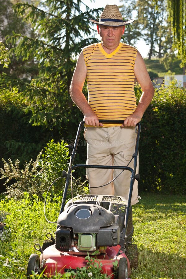 Man Mowing The Lawn Picture. Image: 20033413