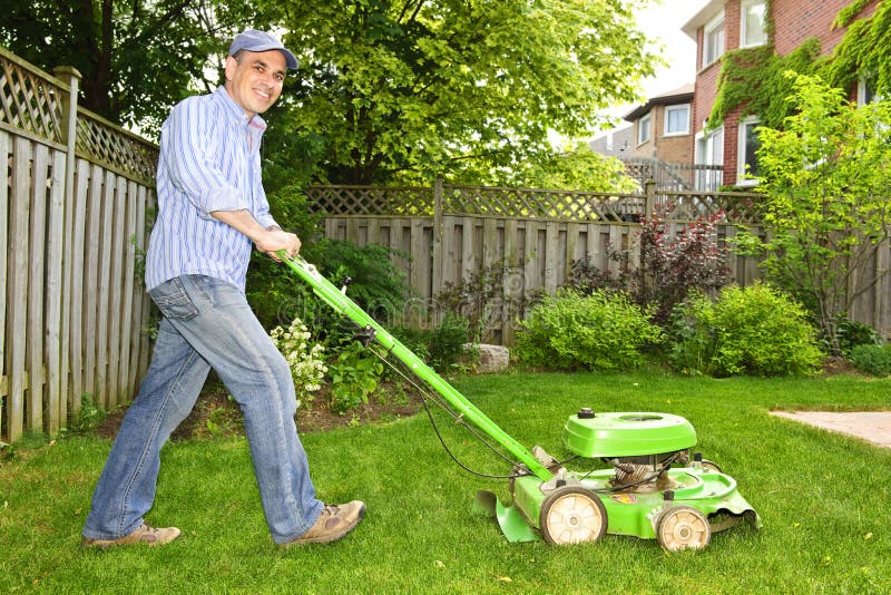 Man mowing lawn stock image. Image of home, chores, outdoors - 32197071