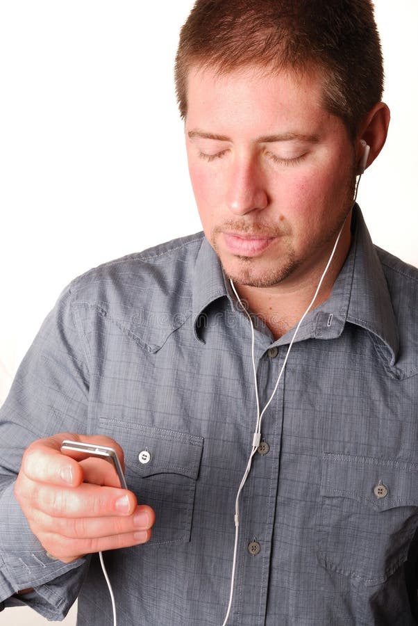 Man with mp3 player stock photo. Image of mobility, modern - 3243858