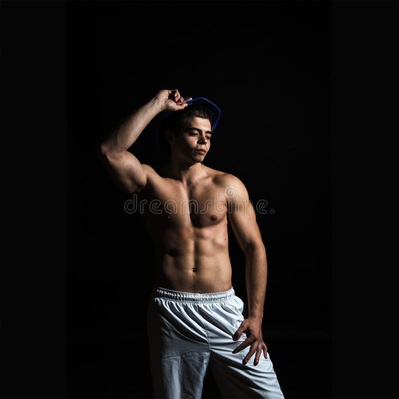 Young Muscle Body Man in Studio Stock Photo - Image of sport, male ...