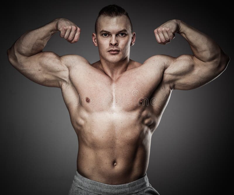Man with muscular torso stock image. Image of active - 49694405