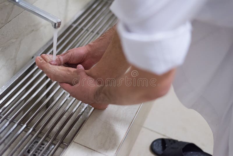 Man Muslim Perform Ablution or Wudu at the Mosque. Washing before Pray ...