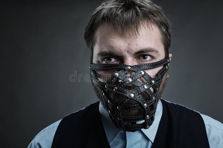 Man in muzzle stock photo. Image of aggression, gray - 53302670