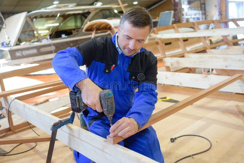 Man nailing framework stock image. Image of builder - 268278261