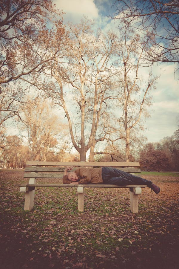 Man Napping on a Bench stock photo. Image of aged, healthy - 28039460