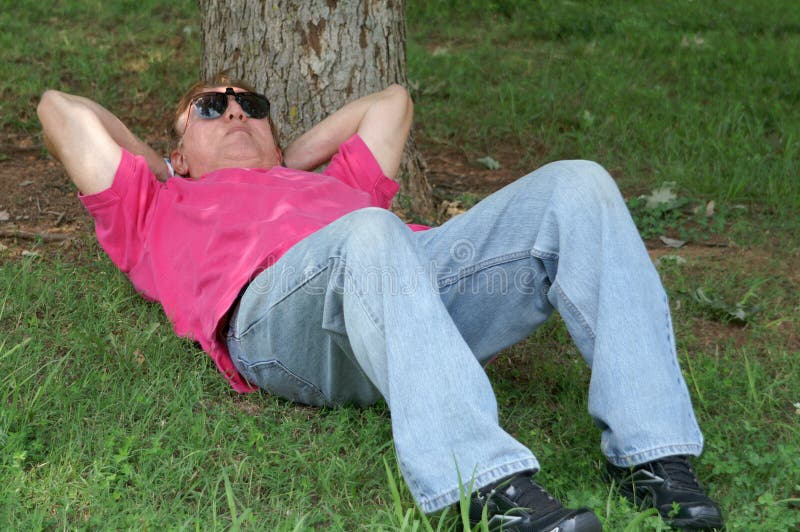 Man Napping on Ground stock image. Image of leisure, dreaming - 20317965