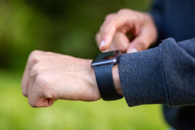 Man using smart watch stock image. Image of electronic - 178239315