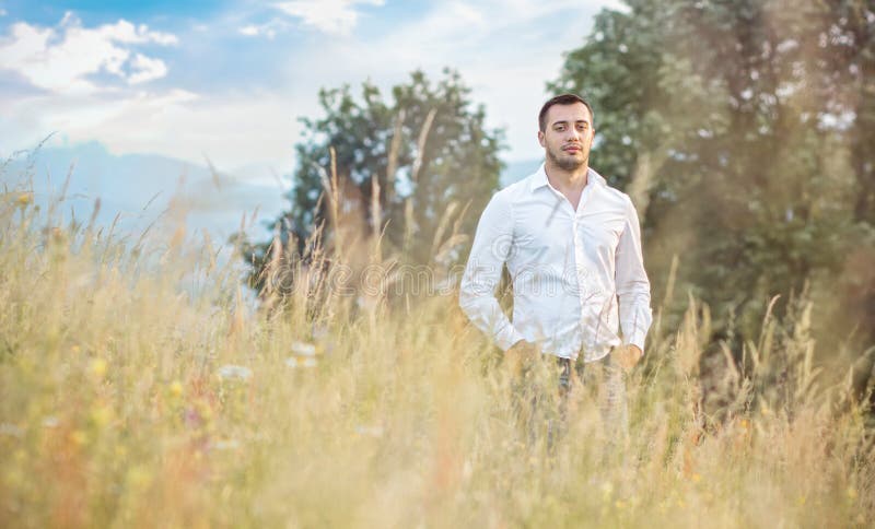 Man in nature stock photo. Image of beautiful, gorgeous - 56361164