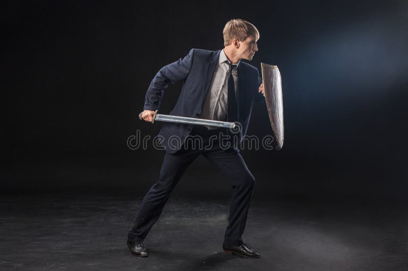 Man Navy Suit Stands Poised Sword Shield Stock Photos - Free & Royalty ...