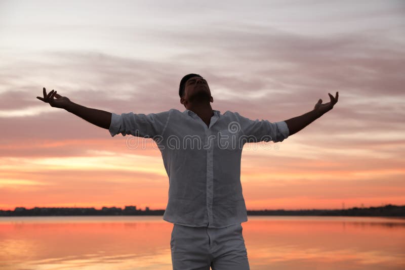 Man Near River at Sunset. Nature Healing Power Stock Image - Image of ...