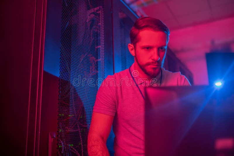 Man Near Server Rack at Computer in Datacenter Stock Photo - Image of ...