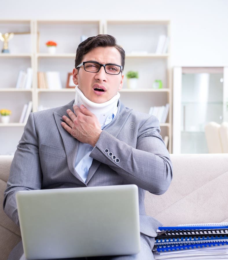 Man in Neck Brace Cervical Collar Working from Home Teleworking Stock ...