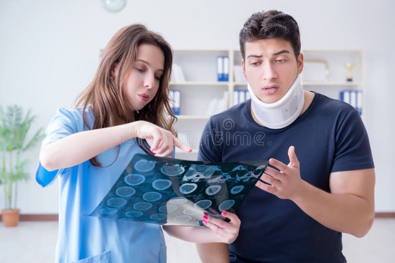 The Man with Neck Injury Visiting Doctor for Check-up Stock Photo ...