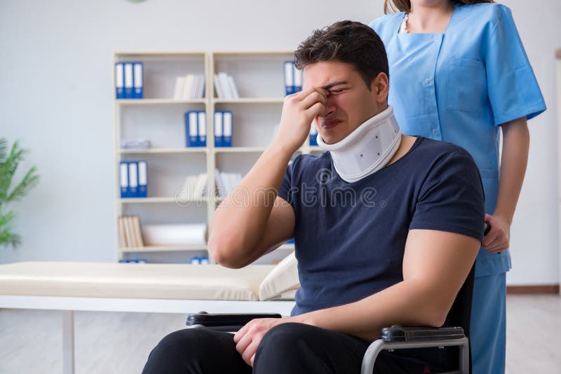 The Man with Neck Injury Visiting Doctor for Check-up Stock Photo ...