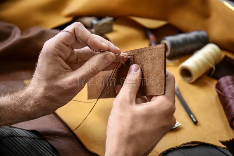Man with Needle Sewing Leather in Workshop Stock Image - Image of ...
