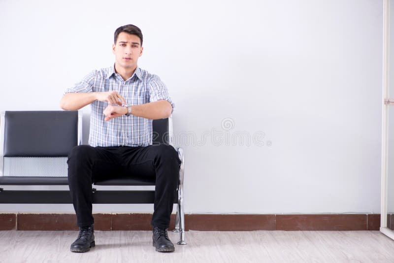 The Man Nervously Impatiently Waiting in the Lobby Stock Image - Image ...