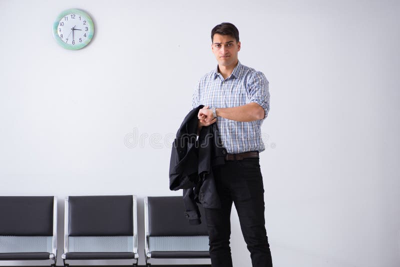 The Man Nervously Impatiently Waiting in the Lobby Stock Image - Image ...