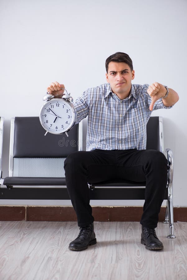 The Man Nervously Impatiently Waiting in the Lobby Stock Photo - Image ...