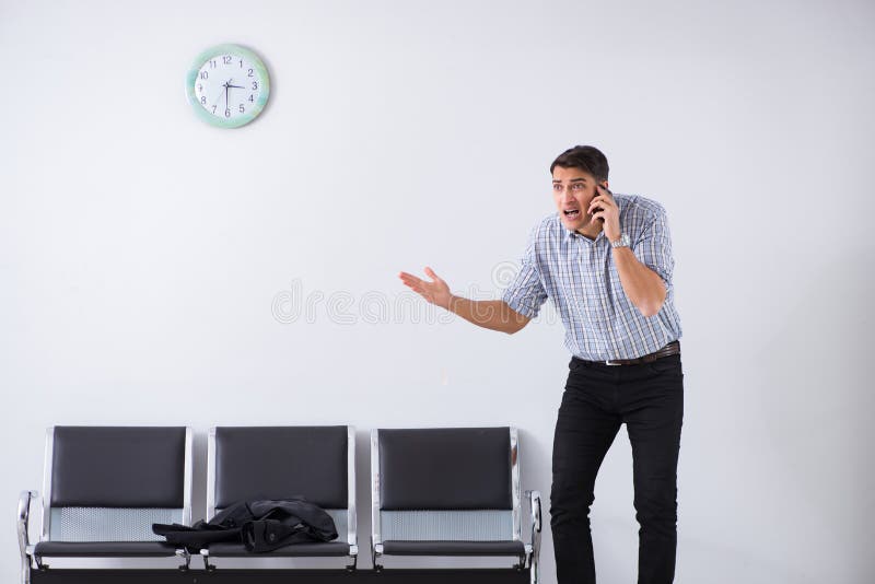 The Man Nervously Impatiently Waiting in the Lobby Stock Image - Image ...