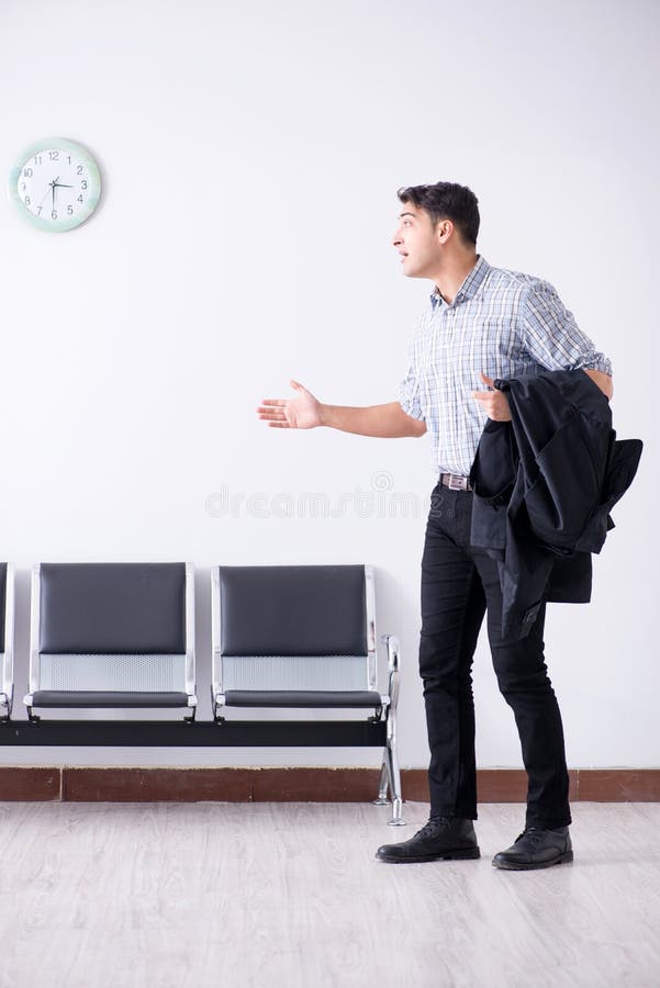 The Man Nervously Impatiently Waiting in the Lobby Stock Photo - Image ...