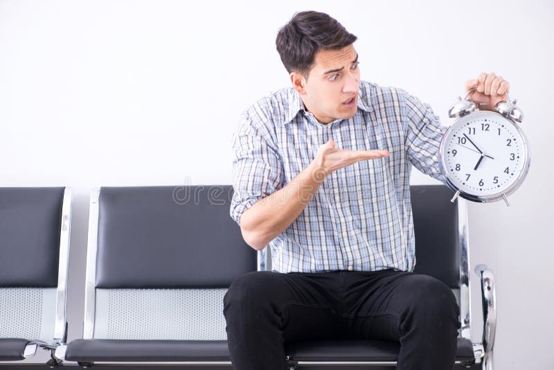 The Man Nervously Impatiently Waiting in the Lobby Stock Photo - Image ...