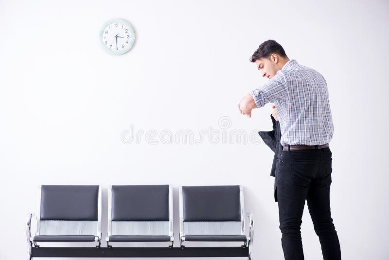 The Man Nervously Impatiently Waiting in the Lobby Stock Image - Image ...