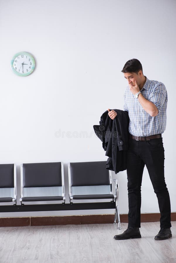 The Man Nervously Impatiently Waiting in the Lobby Stock Image - Image ...