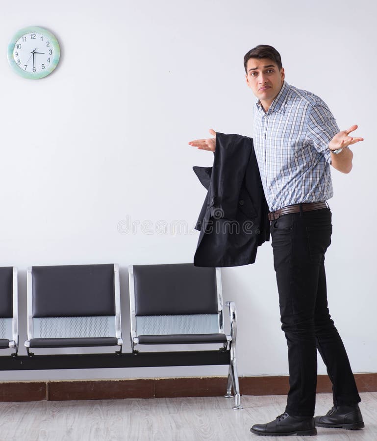 The Man Nervously Impatiently Waiting in the Lobby Stock Image - Image ...