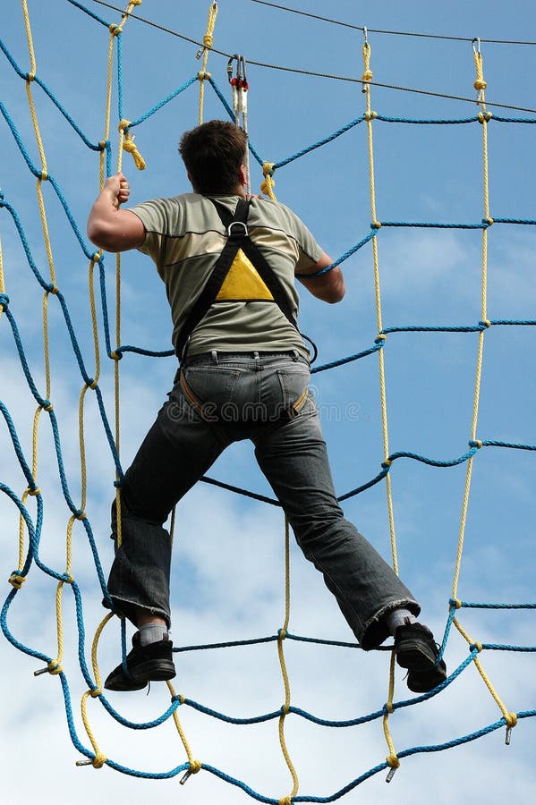 Man in net stock photo. Image of climbing, active, strong - 1081792