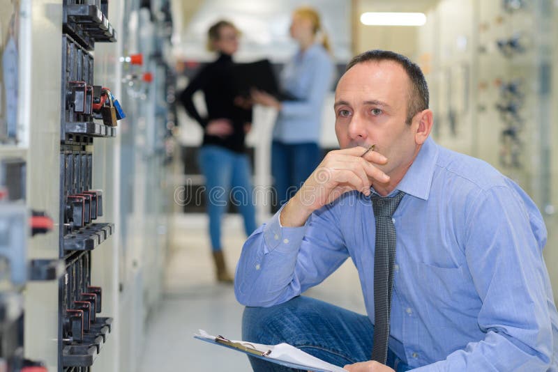 Man in network server room stock photo. Image of room - 153017270