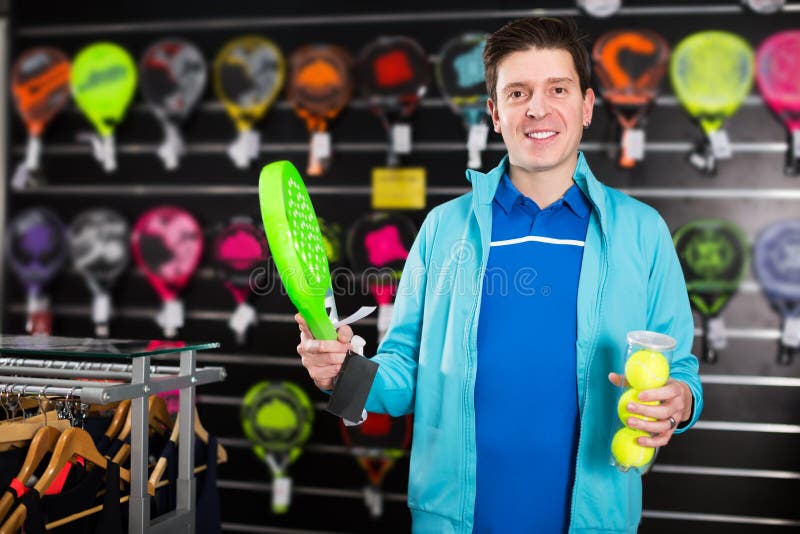 Man with new padel rocket stock photo. Image of athlete - 197195904