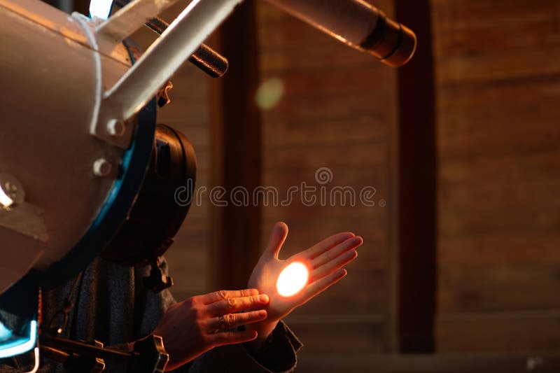 Man Observes Glowing Spot of Telescope Light on Hand Stock Photo ...