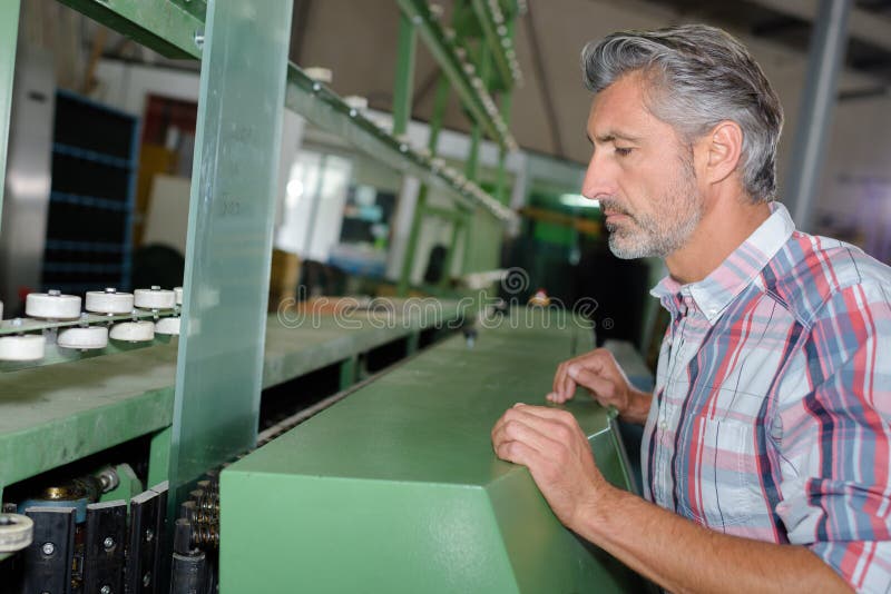 Man Observing Industrial Machine Stock Image - Image of skilled ...