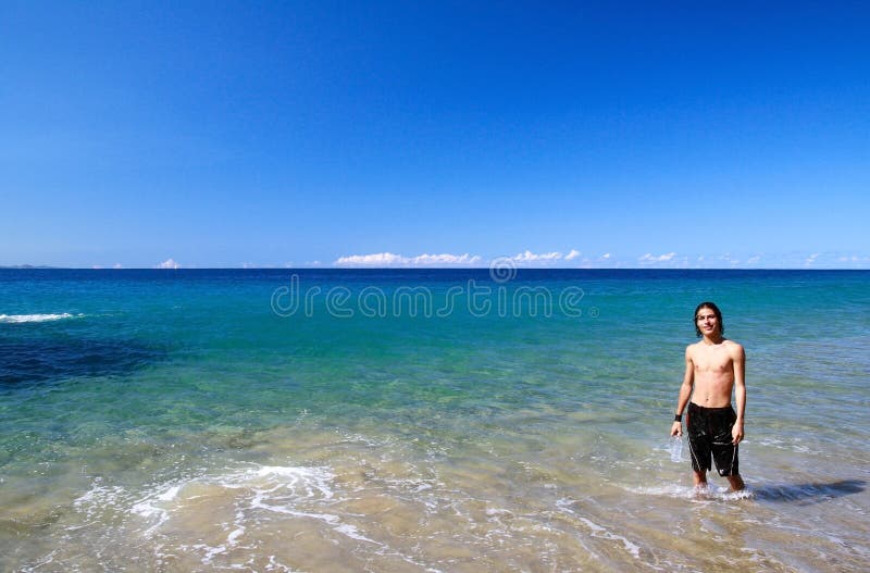 Man in ocean stock image. Image of horizon, blue, beach - 13493741
