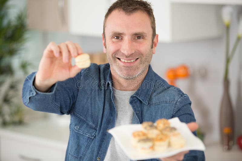 Man Offering Canape from Plate he Holding Stock Photo - Image of ...