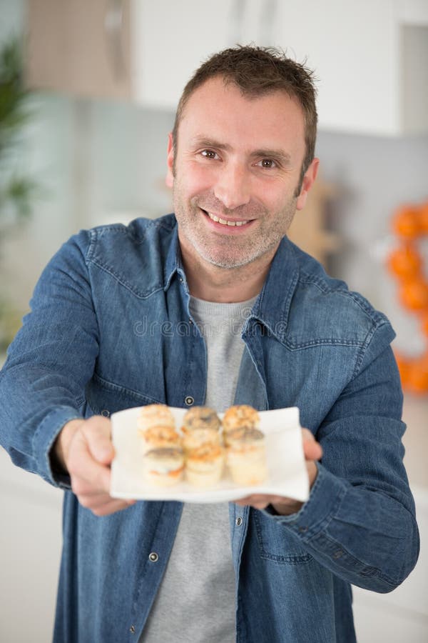 Man Offering Pastry Appetizers Stock Photo - Image of volauvent ...