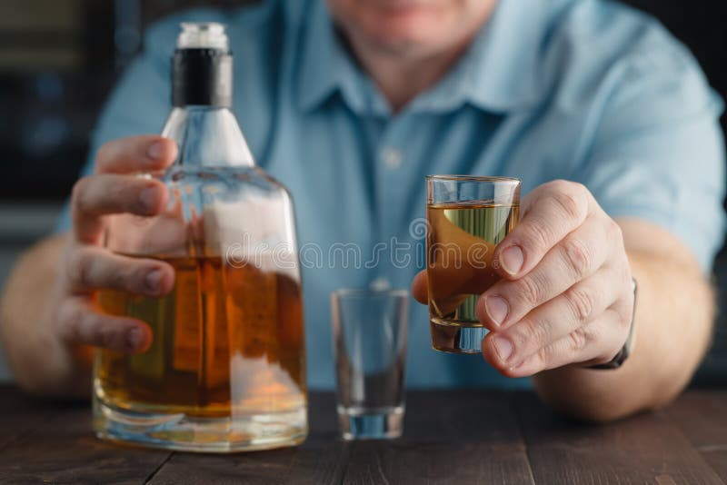 Man Offering Some Shot of Alcohol As a Solution To Your Problems Stock ...