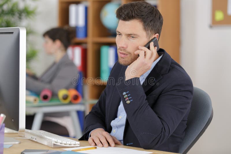Man in Office with Computer at Work Stock Image - Image of phone ...