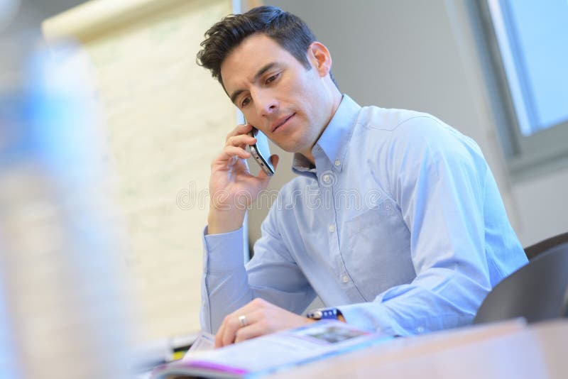 Man in Office with Mobile Phone Stock Image - Image of dialogue ...