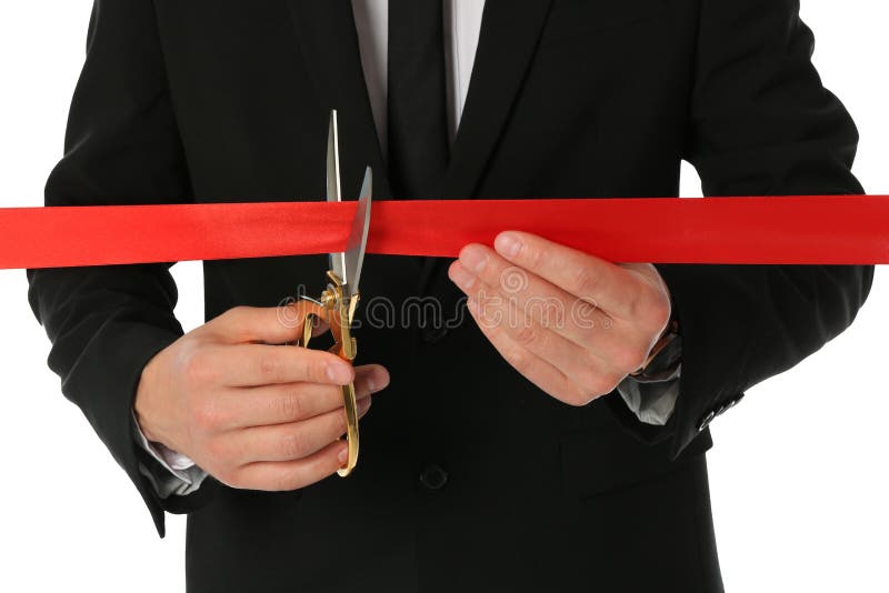 Man in Office Suit Cutting Red Ribbon Isolated on White Stock Image ...