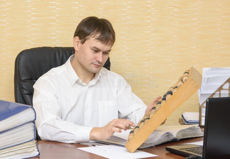 The Man in the Office Thinks the Accounts Stock Photo - Image of ...