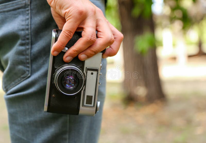 Man with Old Camera in a Hand. Stock Image - Image of glasses ...